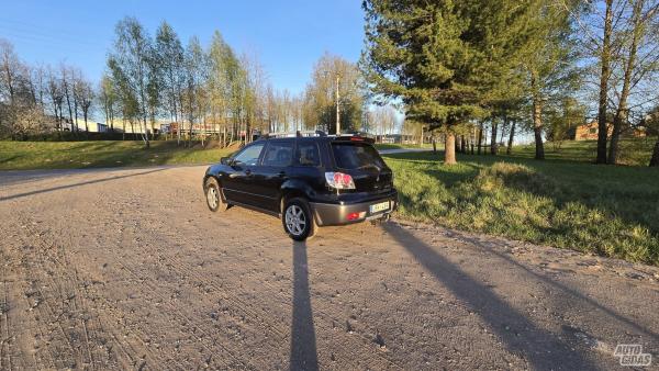 Melns Mitsubishi Outlander 2004 Kauņa, ar dzinēja tilpumu 2.40 L un nobraukumu 210 tūkst. km par 2400 €, foto 5 vietnē AUTOMOTO.COM.LV