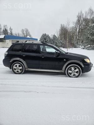 Melns Mitsubishi Outlander 2005 Gulbene, ar dzinēja tilpumu 2.40 L un nobraukumu 304 tūkst. km par 2050 €, foto 3 vietnē AUTOMOTO.COM.LV