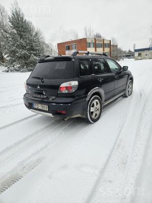 Melns Mitsubishi Outlander 2005 Gulbene, ar dzinēja tilpumu 2.40 L un nobraukumu 304 tūkst. km par 2050 €, foto 4 vietnē AUTOMOTO.COM.LV