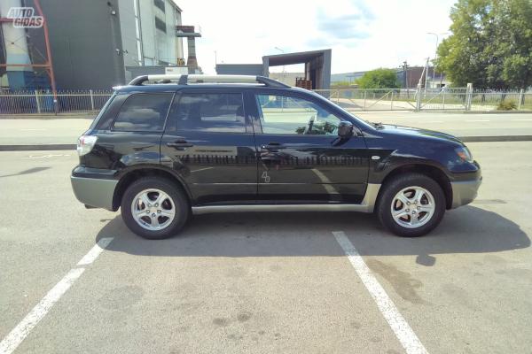 Melns Mitsubishi Outlander 2005 Marijampole, ar dzinēja tilpumu 2.00 L un nobraukumu 291 tūkst. km par 1500 €, foto 5 vietnē AUTOMOTO.COM.LV