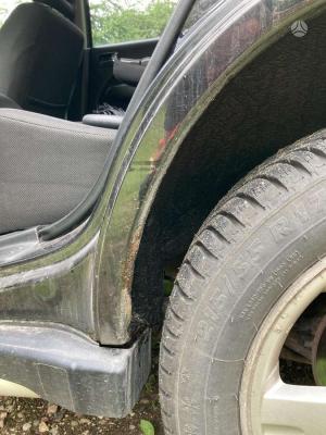 Melns Mitsubishi Outlander 2005 Viļņa, ar dzinēja tilpumu 2.00 L un nobraukumu 260 tūkst. km par 800 €, foto 10 vietnē AUTOMOTO.COM.LV