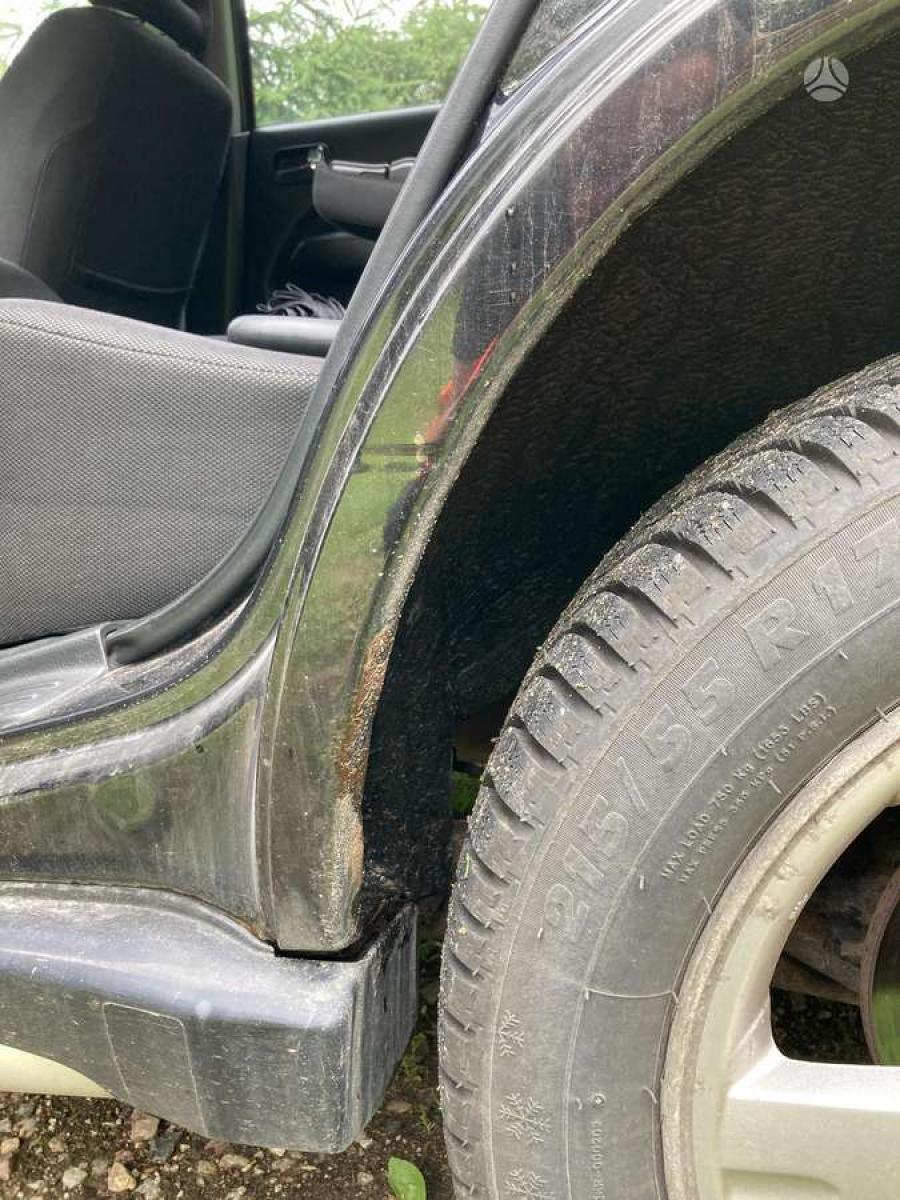 Melns Mitsubishi Outlander 2005 Viļņa, ar dzinēja tilpumu 2.00 L un nobraukumu 260 tūkst. km par 800 €, foto 10 vietnē AUTOMOTO.COM.LV