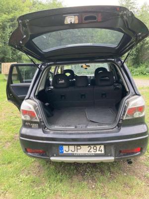 Melns Mitsubishi Outlander 2005 Viļņa, ar dzinēja tilpumu 2.00 L un nobraukumu 260 tūkst. km par 800 €, foto 12 vietnē AUTOMOTO.COM.LV