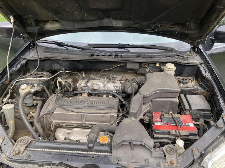 Melns Mitsubishi Outlander 2005 Viļņa, ar dzinēja tilpumu 2.00 L un nobraukumu 260 tūkst. km par 800 €, foto 16 vietnē AUTOMOTO.COM.LV