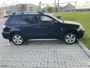Melns Mitsubishi Outlander 2006 Liepāja, ar dzinēja tilpumu 2.40 L un nobraukumu 279 tūkst. km par 2000 €, foto 6 vietnē AUTOMOTO.COM.LV