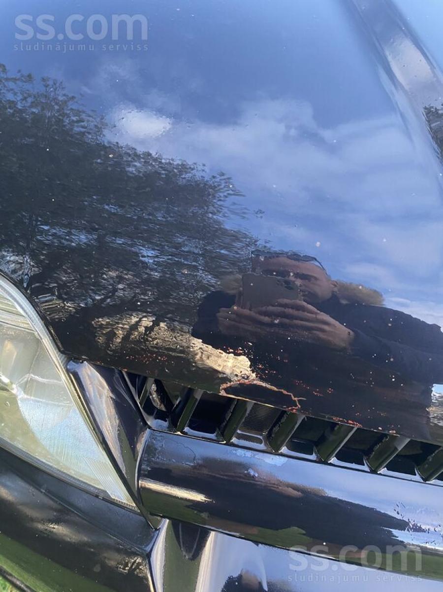 Melns Mitsubishi Outlander 2006 Liepāja, ar dzinēja tilpumu 2.40 L un nobraukumu 279 tūkst. km par 2000 €, foto 10 vietnē AUTOMOTO.COM.LV