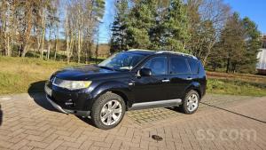 Melns Mitsubishi Outlander 2007 Rīga, ar dzinēja tilpumu 2.40 L un nobraukumu 224 tūkst. km par 3600 €, foto 4 vietnē AUTOMOTO.COM.LV