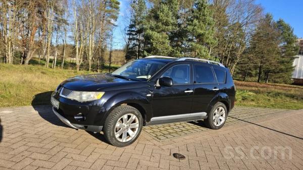Melns Mitsubishi Outlander 2007 Rīga, ar dzinēja tilpumu 2.40 L un nobraukumu 224 tūkst. km par 3600 €, foto 1 vietnē AUTOMOTO.COM.LV