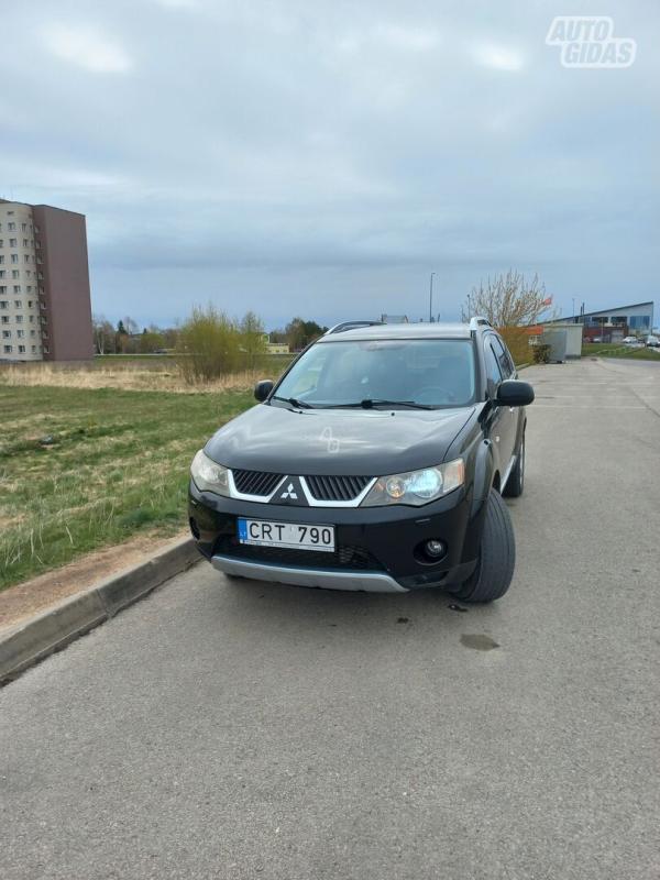 Melns Mitsubishi Outlander 2007 Radviliškis, ar dzinēja tilpumu 2.00 L un nobraukumu 265 tūkst. km par 3000 €, foto 1 vietnē AUTOMOTO.COM.LV