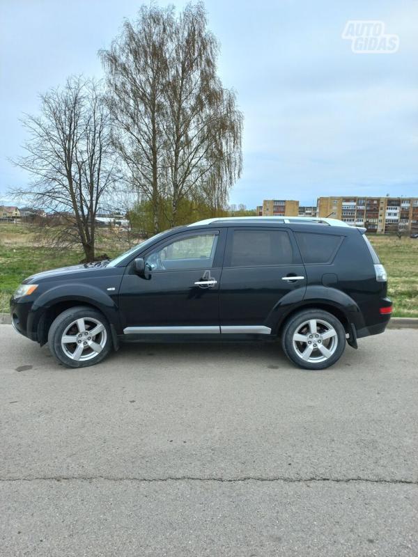 Melns Mitsubishi Outlander 2007 Radviliškis, ar dzinēja tilpumu 2.00 L un nobraukumu 265 tūkst. km par 3000 €, foto 2 vietnē AUTOMOTO.COM.LV