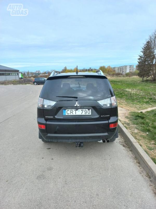 Melns Mitsubishi Outlander 2007 Radviliškis, ar dzinēja tilpumu 2.00 L un nobraukumu 265 tūkst. km par 3000 €, foto 3 vietnē AUTOMOTO.COM.LV