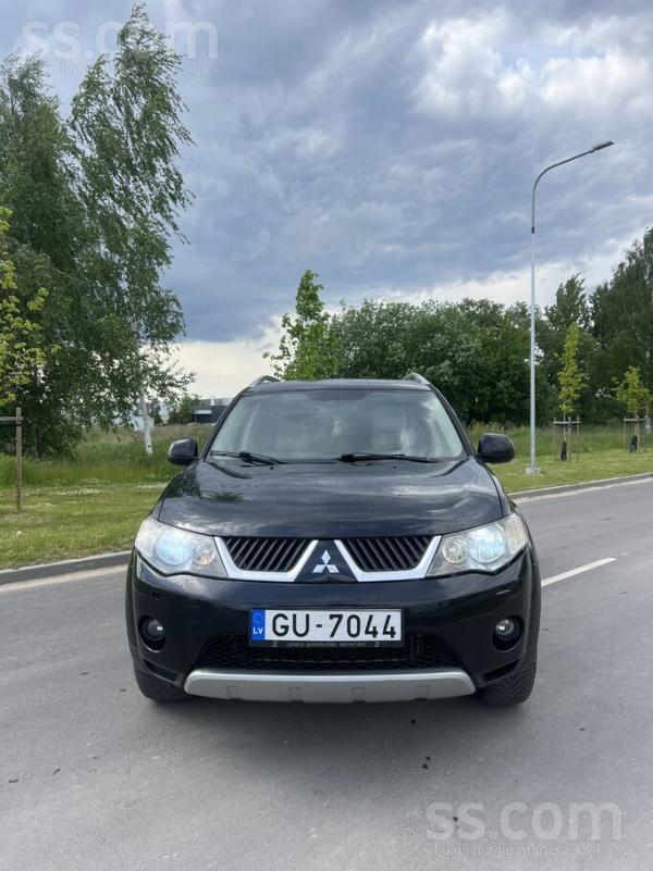 Melns Mitsubishi Outlander 2007 Rīga, ar dzinēja tilpumu 2.40 L un nobraukumu 262 tūkst. km par 2790 €, foto 2 vietnē AUTOMOTO.COM.LV