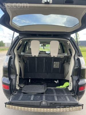 Black Mitsubishi Outlander 2007 in Riga, with an engine capacity of 2.40 L and mileage of 262 thousand km for 2790 €, photo 12 on AUTOMOTO.COM.LV