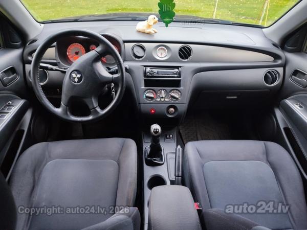 Melns Mitsubishi Outlander 2007 Tallina, ar dzinēja tilpumu 2.00 L un nobraukumu 160 tūkst. km par 2499 €, foto 4 vietnē AUTOMOTO.COM.LV