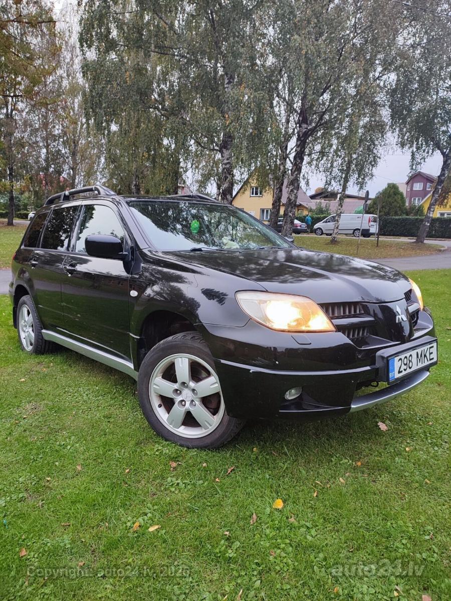 Melns Mitsubishi Outlander 2007 Tallina, ar dzinēja tilpumu 2.00 L un nobraukumu 160 tūkst. km par 2499 €, foto 1 vietnē AUTOMOTO.COM.LV