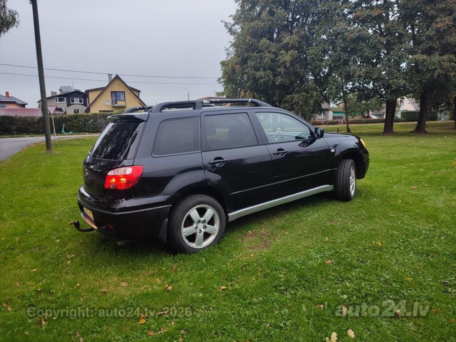 Melns Mitsubishi Outlander 2007 Tallina, ar dzinēja tilpumu 2.00 L un nobraukumu 160 tūkst. km par 2499 €, foto 6 vietnē AUTOMOTO.COM.LV