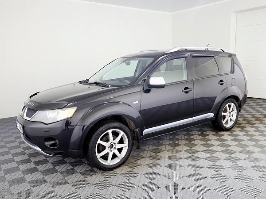 Black Mitsubishi Outlander 2007 in Tallinn, with an engine capacity of 2.40 L and mileage of 305 thousand km for 2099 €, photo 3 on AUTOMOTO.COM.LV