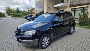 Melns Mitsubishi Outlander 2007 Viļņa, ar dzinēja tilpumu 0.00 L un nobraukumu 100 tūkst. km par 2890 €, foto  vietnē AUTOMOTO.COM.LV
