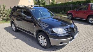 Melns Mitsubishi Outlander 2007 Viļņa, ar dzinēja tilpumu 0.00 L un nobraukumu 100 tūkst. km par 2890 €, foto 3 vietnē AUTOMOTO.COM.LV