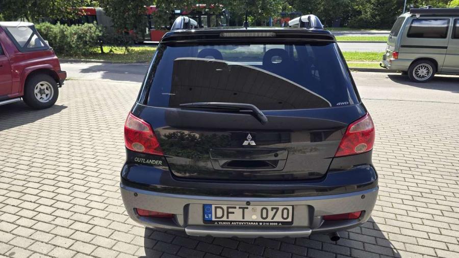 Melns Mitsubishi Outlander 2007 Viļņa, ar dzinēja tilpumu 0.00 L un nobraukumu 100 tūkst. km par 2890 €, foto 7 vietnē AUTOMOTO.COM.LV