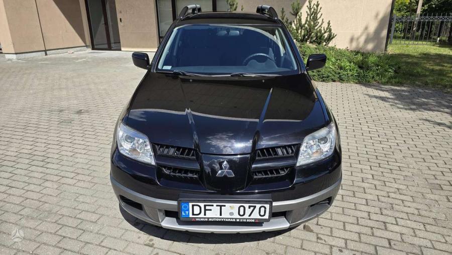 Melns Mitsubishi Outlander 2007 Viļņa, ar dzinēja tilpumu 0.00 L un nobraukumu 100 tūkst. km par 2890 €, foto 8 vietnē AUTOMOTO.COM.LV