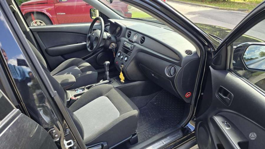 Black Mitsubishi Outlander 2007 in Vilnius, with an engine capacity of 2.00 L and mileage of 100 thousand km for 2790 €, photo 16 on AUTOMOTO.COM.LV