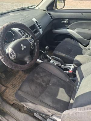 Black Mitsubishi Outlander 2007 in Dobele, with an engine capacity of 2.00 L and mileage of 323 thousand km for 850 €, photo 6 on AUTOMOTO.COM.LV