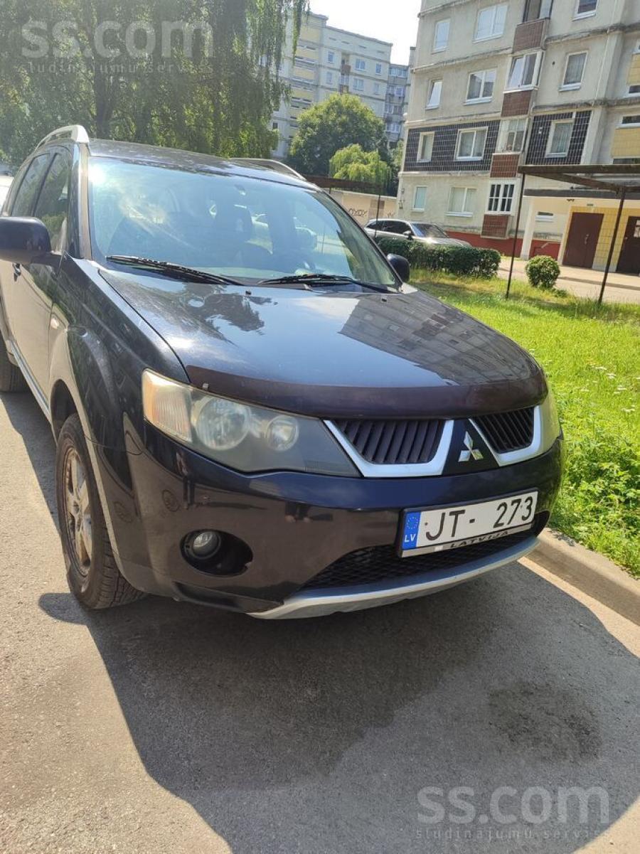 Melns Mitsubishi Outlander 2007 Rīga, ar dzinēja tilpumu 2.00 L un nobraukumu 386 tūkst. km par 2200 €, foto 1 vietnē AUTOMOTO.COM.LV