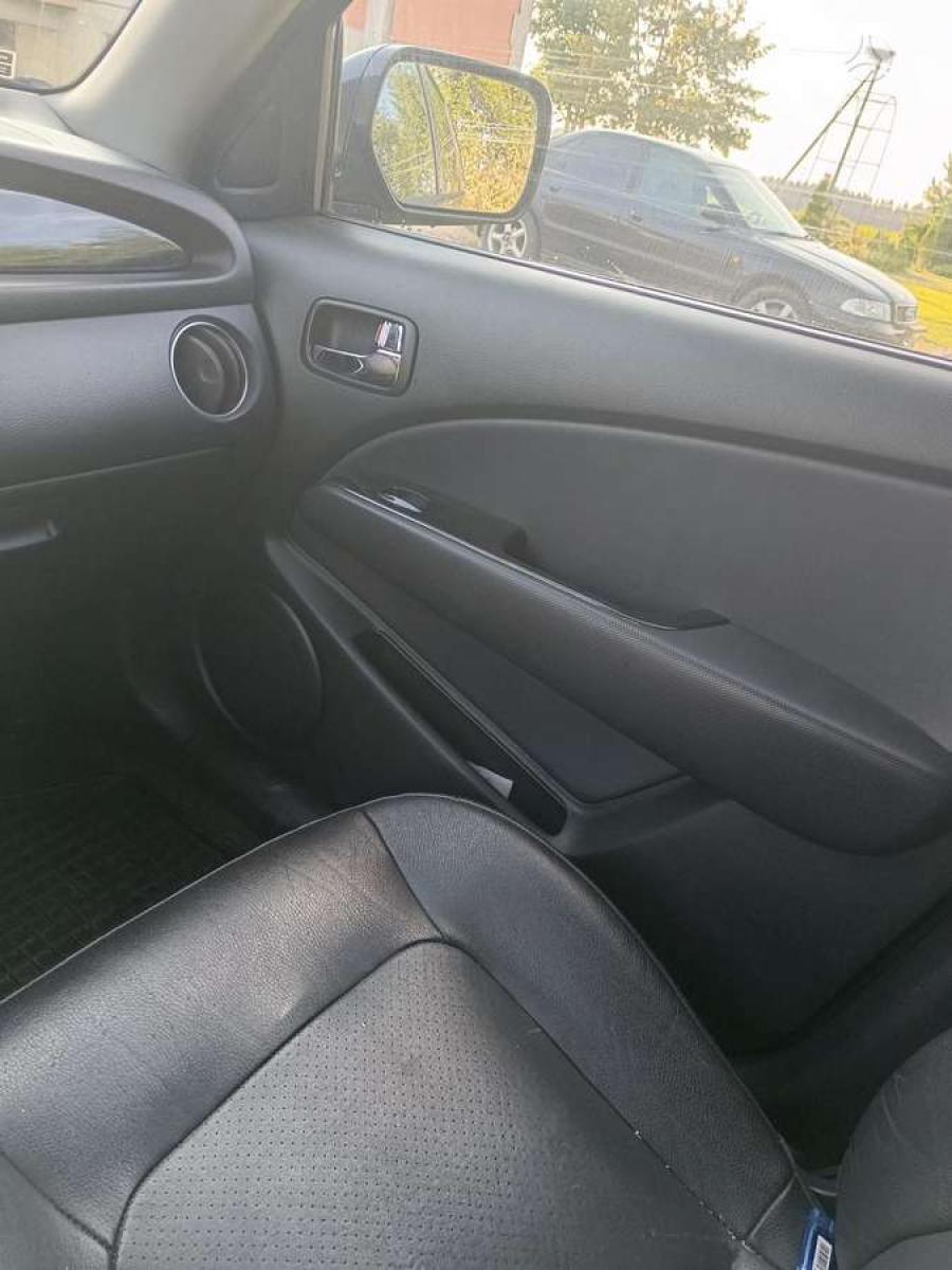 Black Mitsubishi Outlander 2007 in Kretinga, with an engine capacity of 2.38 L and mileage of 222 thousand km for 2000 €, photo 13 on AUTOMOTO.COM.LV