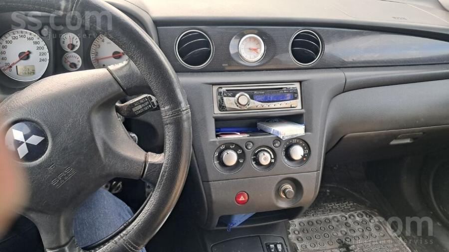 Melns Mitsubishi Outlander 2007 Rīga, ar dzinēja tilpumu 2.40 L un nobraukumu 262 tūkst. km par 1000 €, foto 5 vietnē AUTOMOTO.COM.LV