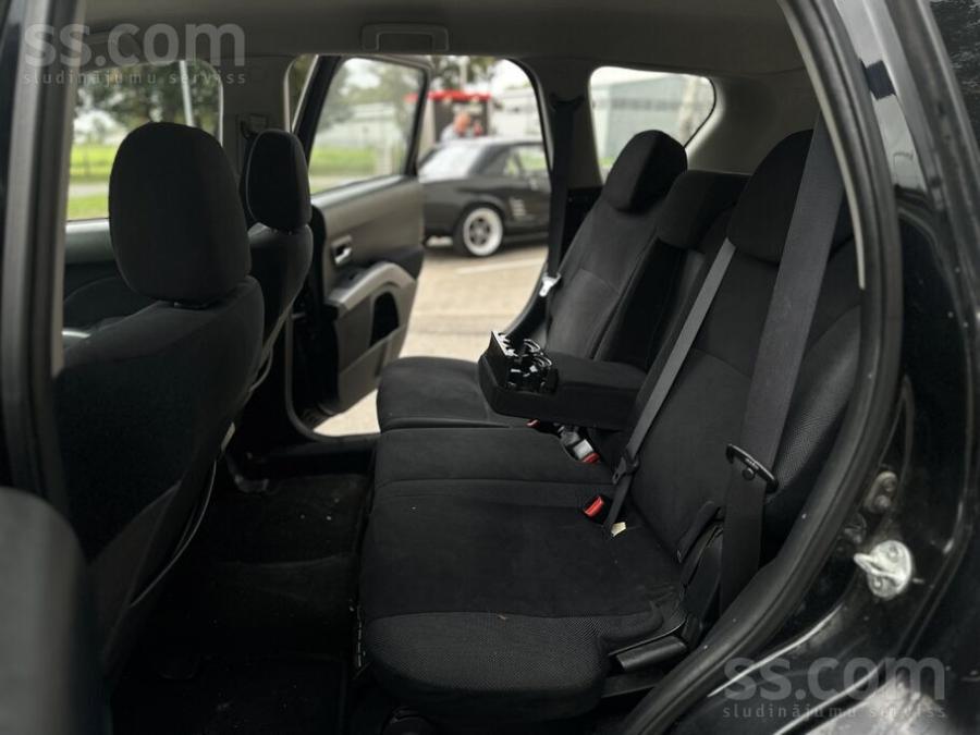 Black Mitsubishi Outlander 2007 in Riga, with an engine capacity of 2.00 L and mileage of 352 thousand km for 2090 €, photo 12 on AUTOMOTO.COM.LV