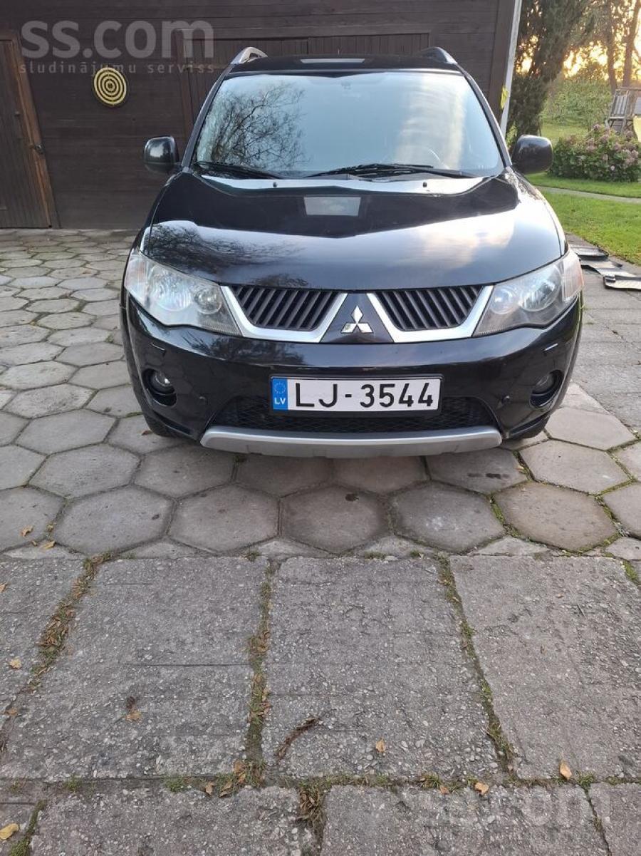 Melns Mitsubishi Outlander 2007 Jūrmala, ar dzinēja tilpumu 2.00 L un nobraukumu 225 tūkst. km par 2800 €, foto 1 vietnē AUTOMOTO.COM.LV