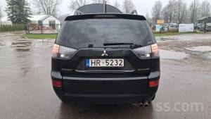 Black Mitsubishi Outlander 2008 in Ogre, with an engine capacity of 2.00 L and mileage of 339 thousand km for 3250 €, photo 7 on AUTOMOTO.COM.LV