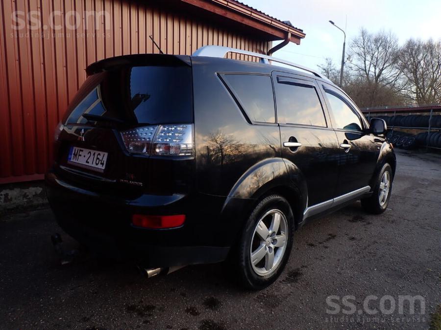 Melns Mitsubishi Outlander 2008 Liepāja, ar dzinēja tilpumu 2.20 L un nobraukumu 373 tūkst. km par 3950 €, foto 2 vietnē AUTOMOTO.COM.LV