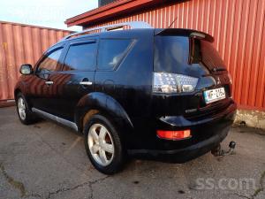 Melns Mitsubishi Outlander 2008 Liepāja, ar dzinēja tilpumu 2.20 L un nobraukumu 373 tūkst. km par 3950 €, foto 3 vietnē AUTOMOTO.COM.LV