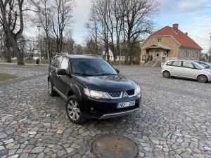 Melns Mitsubishi Outlander 2008 Jēkabpils, ar dzinēja tilpumu 2.20 L un nobraukumu 270 tūkst. km par 4450 €, foto 2 vietnē AUTOMOTO.COM.LV