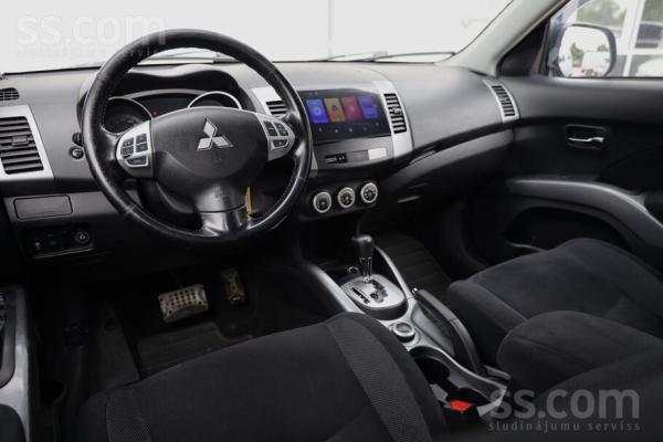 Melns Mitsubishi Outlander 2008 Rīga, ar dzinēja tilpumu 2.40 L un nobraukumu 0 tūkst. km par 2995 €, foto 7 vietnē AUTOMOTO.COM.LV