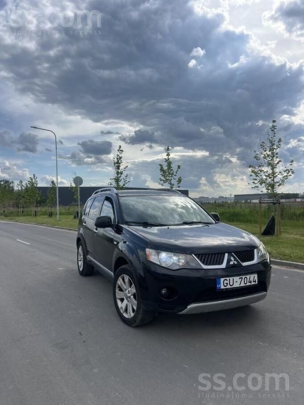 Melns Mitsubishi Outlander 2008 Rīga, ar dzinēja tilpumu 2.40 L un nobraukumu 260 tūkst. km par 1990 €, foto 2 vietnē AUTOMOTO.COM.LV