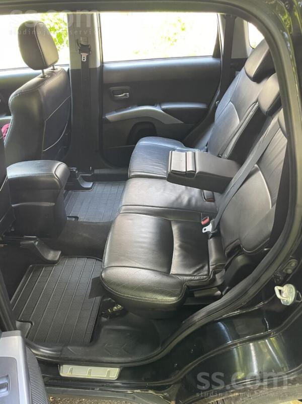 Black Mitsubishi Outlander 2008 in Jurmala, with an engine capacity of 2.20 L and mileage of 342 thousand km for 2500 €, photo 6 on AUTOMOTO.COM.LV