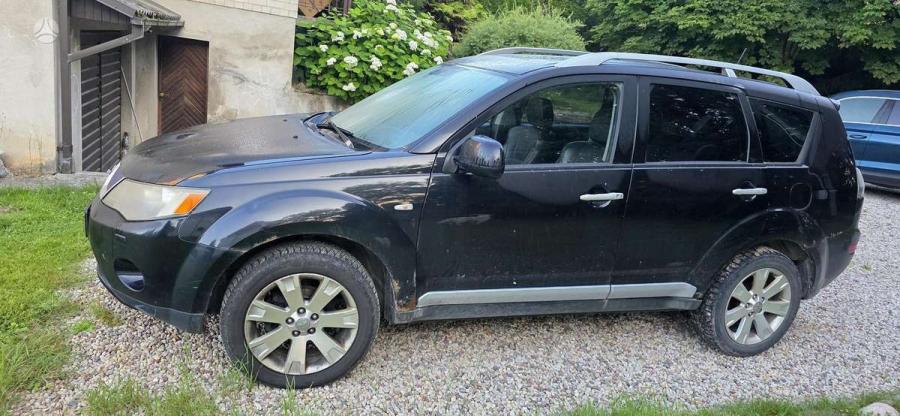 Melns Mitsubishi Outlander 2008 Utena, ar dzinēja tilpumu 2.18 L un nobraukumu 420 tūkst. km par 2200 €, foto 5 vietnē AUTOMOTO.COM.LV
