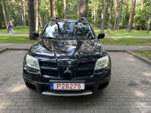 Melns Mitsubishi Outlander 2008 Palanga, ar dzinēja tilpumu 2.40 L un nobraukumu 226 tūkst. km par 1750 €, foto  vietnē AUTOMOTO.COM.LV