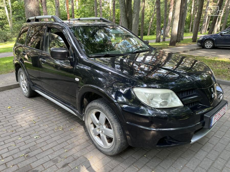 Черный Мицубиси Аутлендер 2008 в Паланга, объемом двигателя 2.40 л и пробегом 226 тыс. км за 1750 €, фото 4 на AUTOMOTO.COM.LV