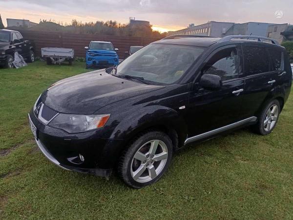 Melns Mitsubishi Outlander 2008 Marijampole, ar dzinēja tilpumu 2.20 L un nobraukumu 310 tūkst. km par 2799 €, foto 2 vietnē AUTOMOTO.COM.LV