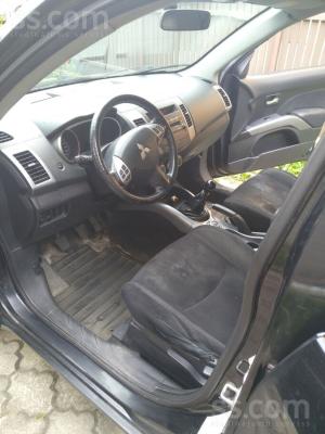 Melns Mitsubishi Outlander 2008 Rīga, ar dzinēja tilpumu 2.00 L un nobraukumu 310 tūkst. km par 2700 €, foto 4 vietnē AUTOMOTO.COM.LV