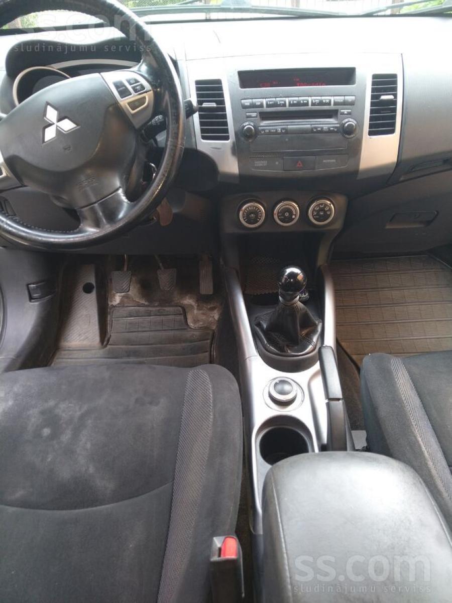Melns Mitsubishi Outlander 2008 Rīga, ar dzinēja tilpumu 2.00 L un nobraukumu 310 tūkst. km par 2700 €, foto 6 vietnē AUTOMOTO.COM.LV