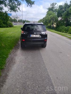 Melns Mitsubishi Outlander 2008 Rīga, ar dzinēja tilpumu 2.00 L un nobraukumu 310 tūkst. km par 2700 €, foto 9 vietnē AUTOMOTO.COM.LV