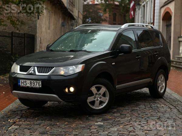 Melns Mitsubishi Outlander 2008 Cēsis, ar dzinēja tilpumu 2.40 L un nobraukumu 377 tūkst. km par 2690 €, foto 4 vietnē AUTOMOTO.COM.LV