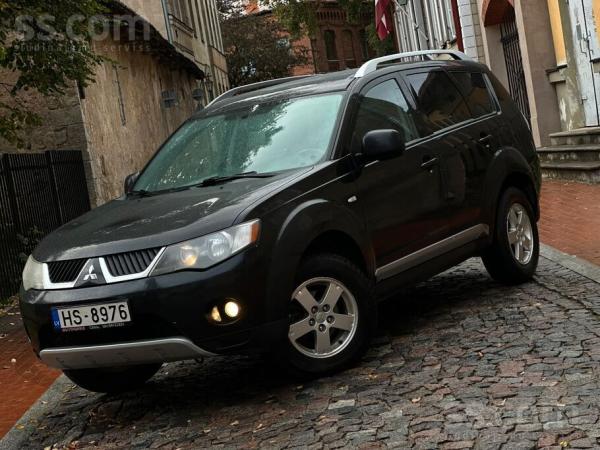 Melns Mitsubishi Outlander 2008 Cēsis, ar dzinēja tilpumu 2.40 L un nobraukumu 377 tūkst. km par 2690 €, foto 5 vietnē AUTOMOTO.COM.LV