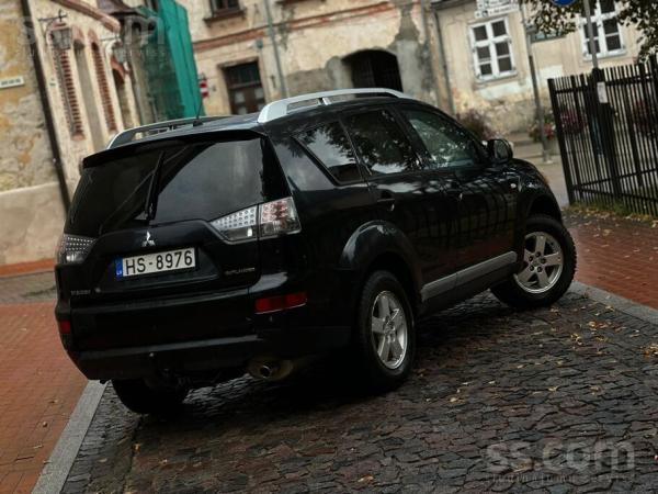 Melns Mitsubishi Outlander 2008 Cēsis, ar dzinēja tilpumu 2.40 L un nobraukumu 377 tūkst. km par 2690 €, foto 9 vietnē AUTOMOTO.COM.LV