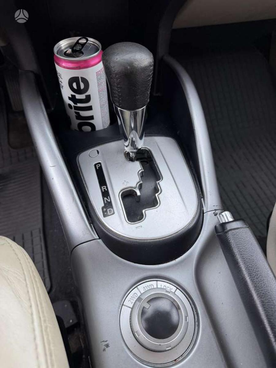 Melns Mitsubishi Outlander 2008 Viļņa, ar dzinēja tilpumu 2.40 L un nobraukumu 369 tūkst. km par 3000 €, foto 13 vietnē AUTOMOTO.COM.LV
